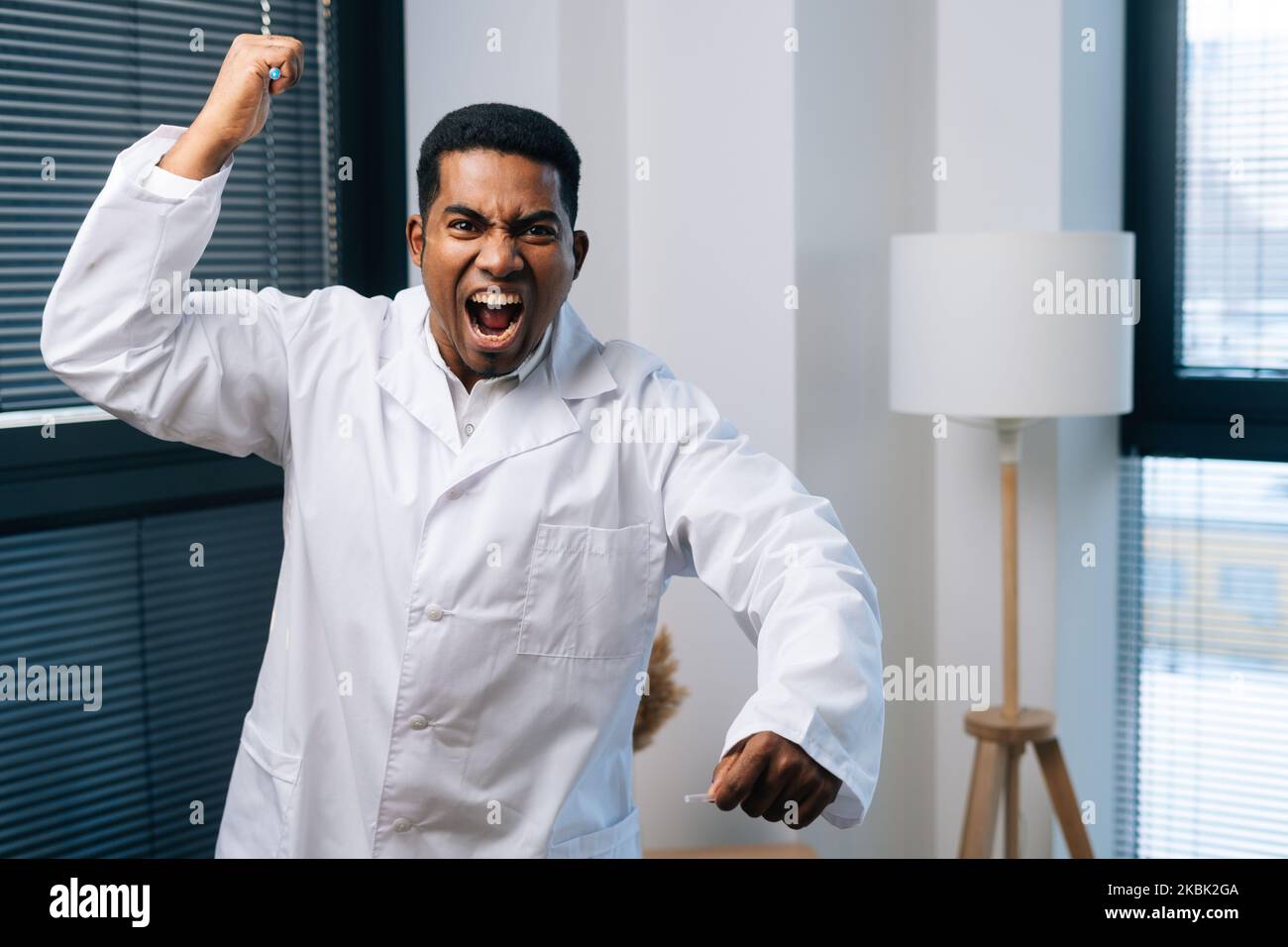 Mad doctor syringe hi-res stock photography and images - Alamy
