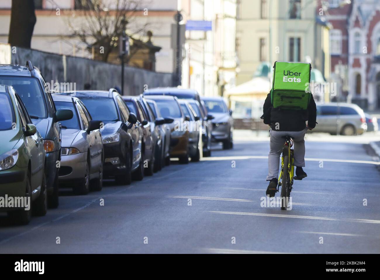 Uber Eats food delivery cyclist is seen on the street of Krakow, Poland ...