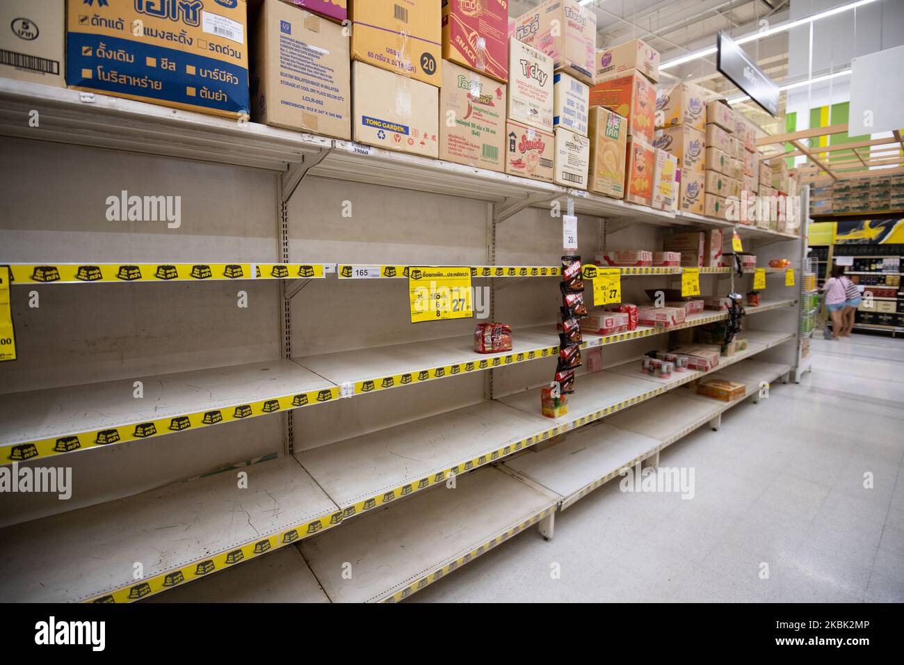 An almost empty shelf is in a supermarket in Bangkok, Thailand on March ...