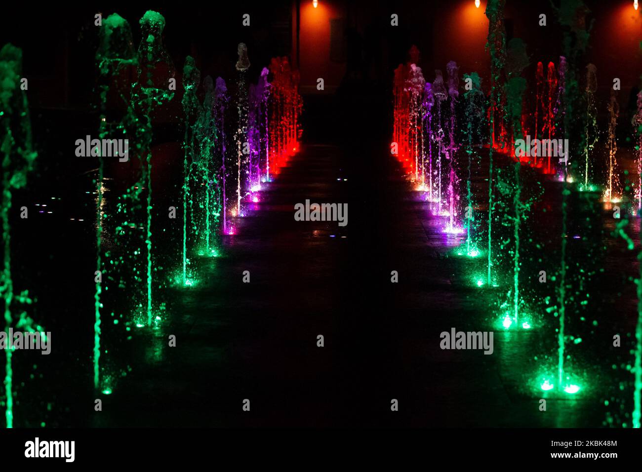 Fountain in front of the Romolo Valli Theater illuminated with the ...