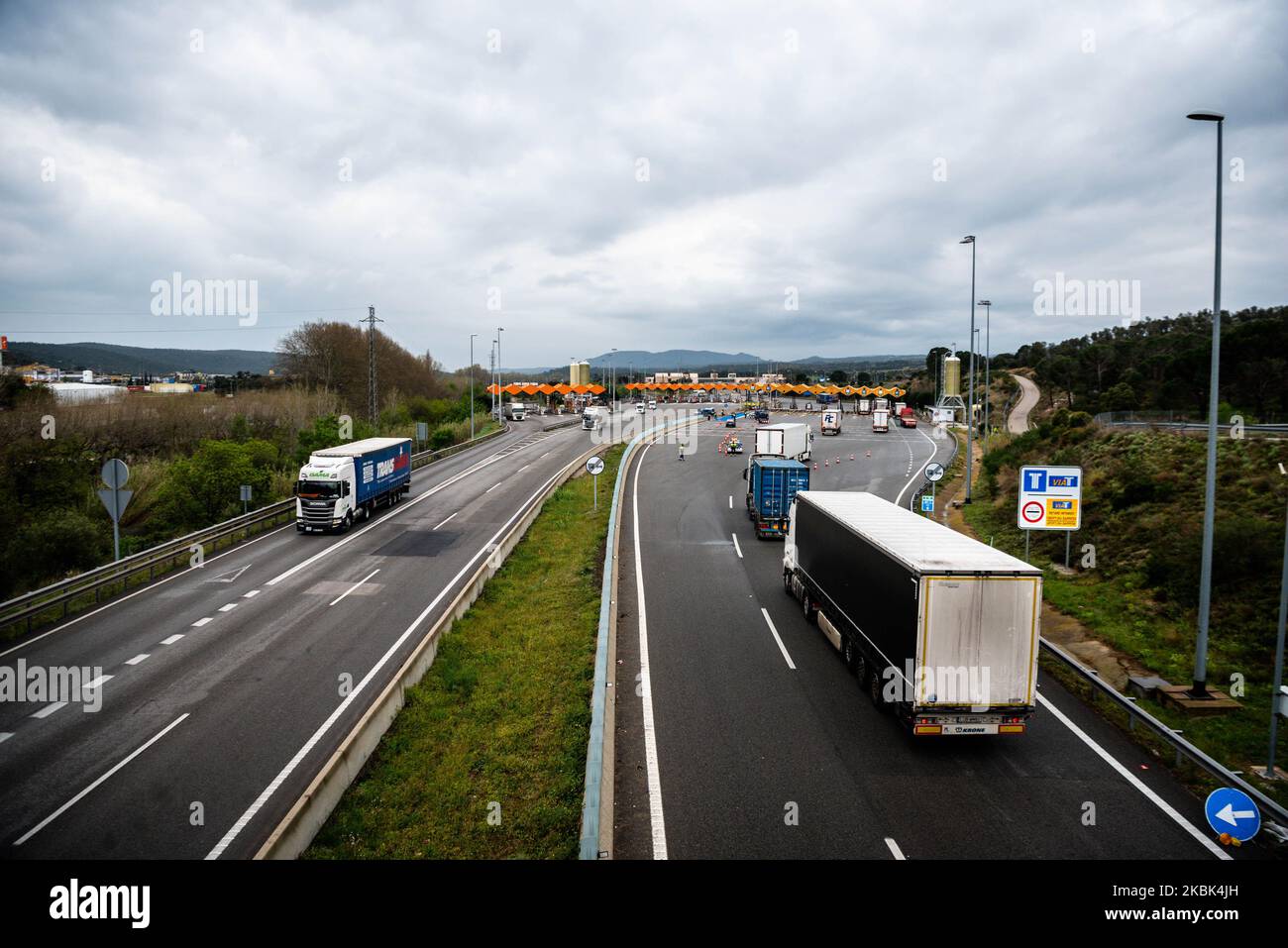 Spanish police forces at the checkpoint control entry and exit at the ...
