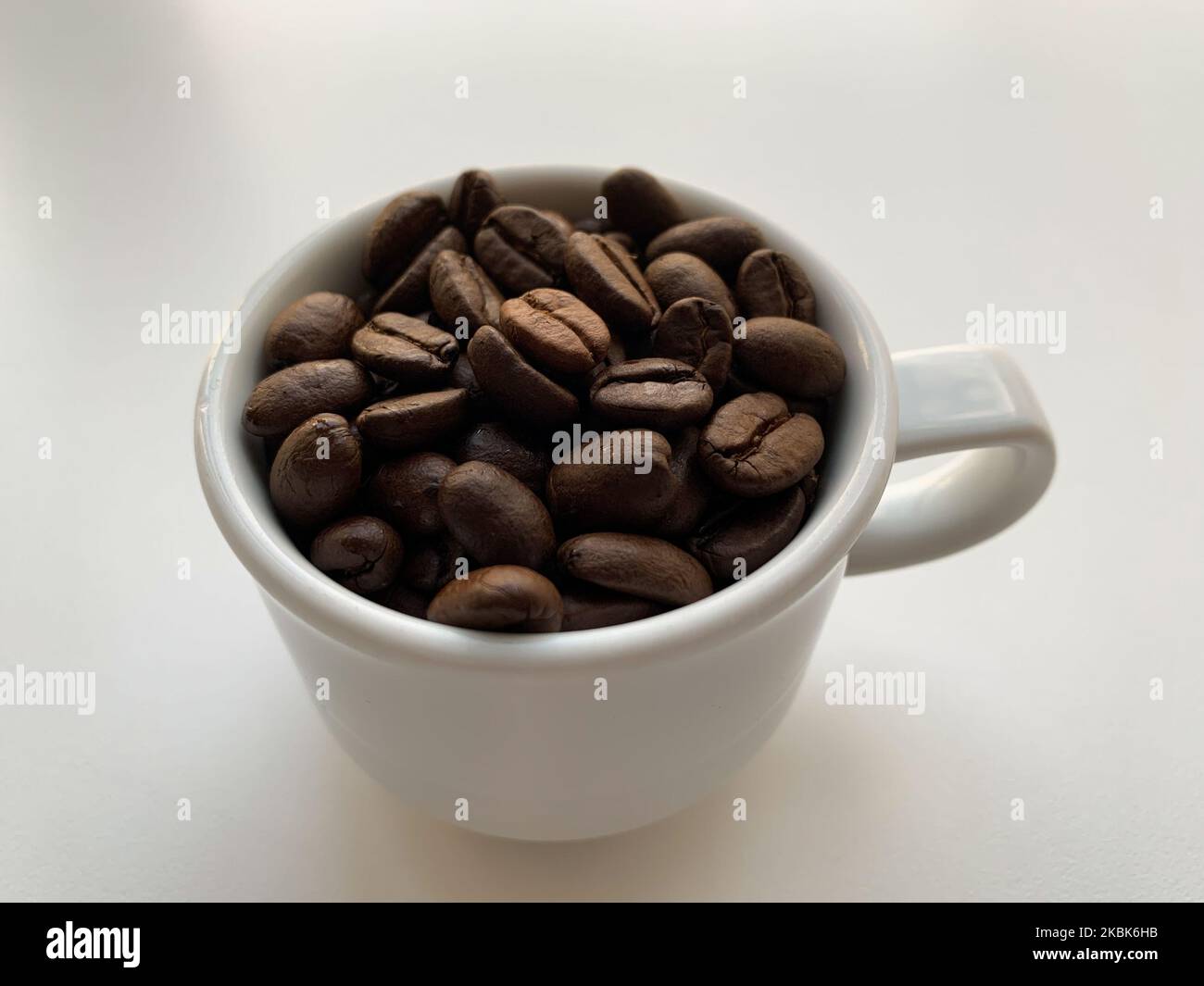 In this photo illustration a Coffee beans in an Espresso Cup is seen in ...