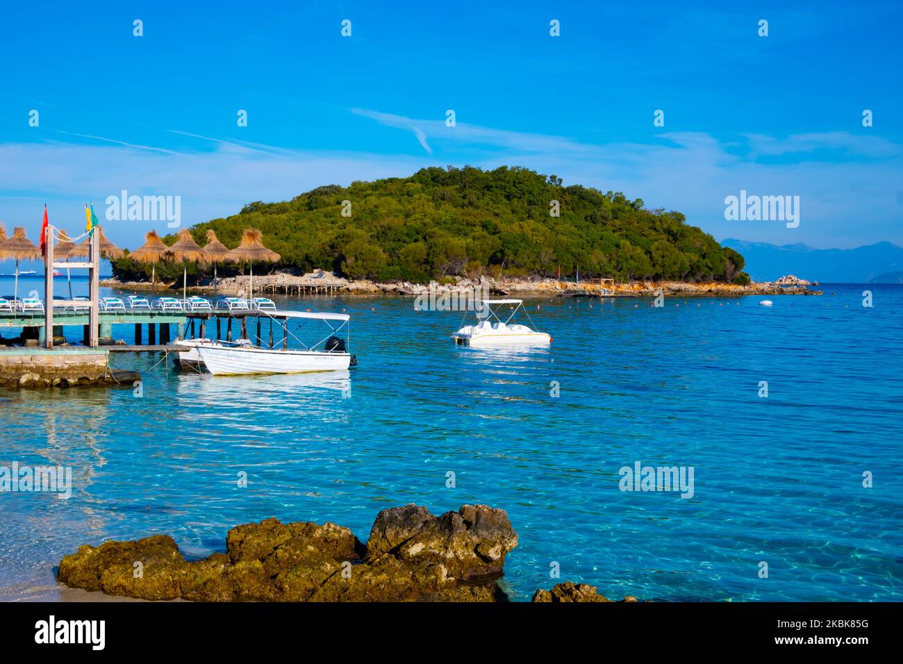 Bay in the Ksamil with ships and islands. Ionian Sea in Albania Stock ...