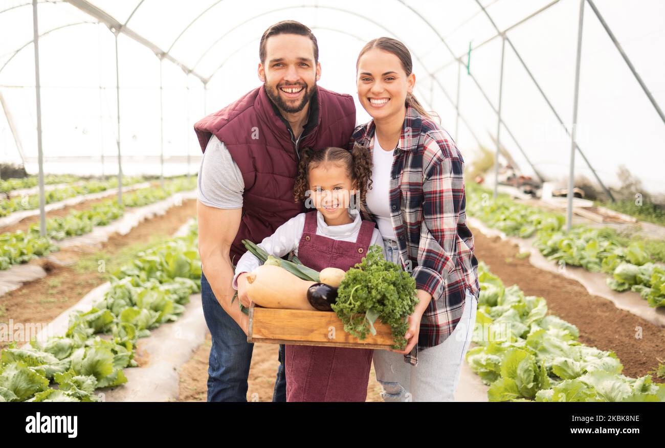 Family, vegetables and greenhouse for eco friendly farming, smile or ...