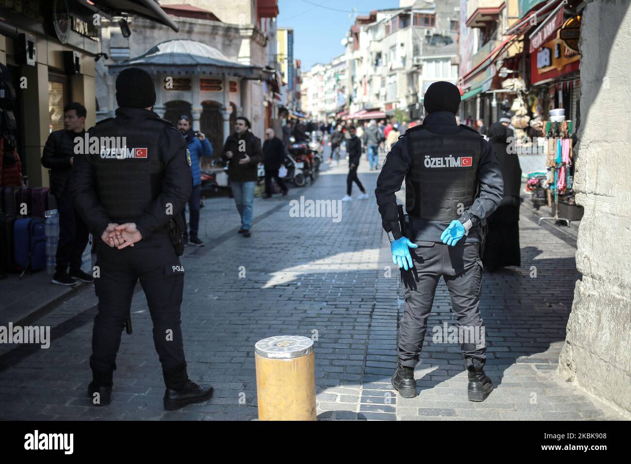 Turkish anti riot police officers guard the entrance to Fatih Mosque at ...