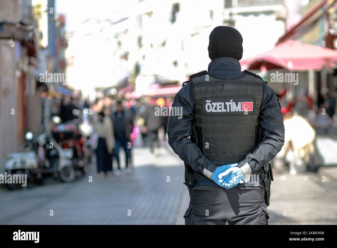Turkish anti riot police officer guard the entrance to Fatih Mosque at ...