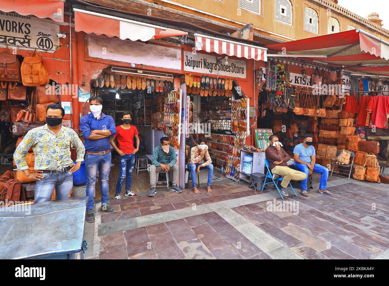 Shopkeeper wear masks hi-res stock photography and images - Alamy