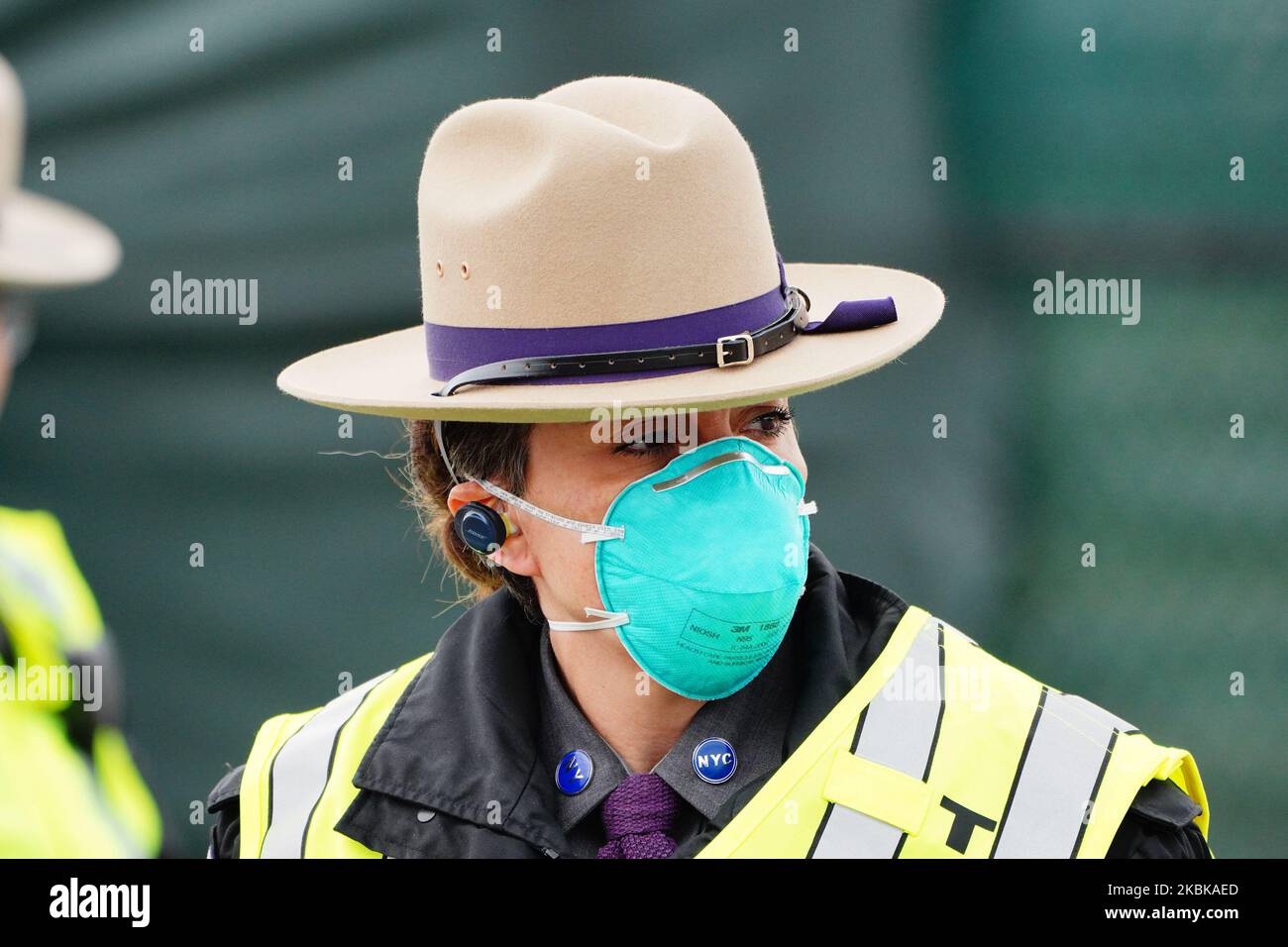 New York State Police Officer wearing a protective gear while working ...