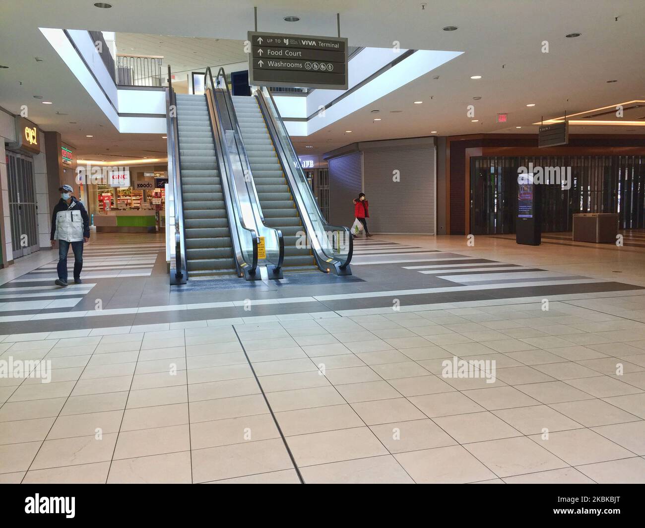 Closed stores seen in an empty shopping mall in Toronto, Ontario ...