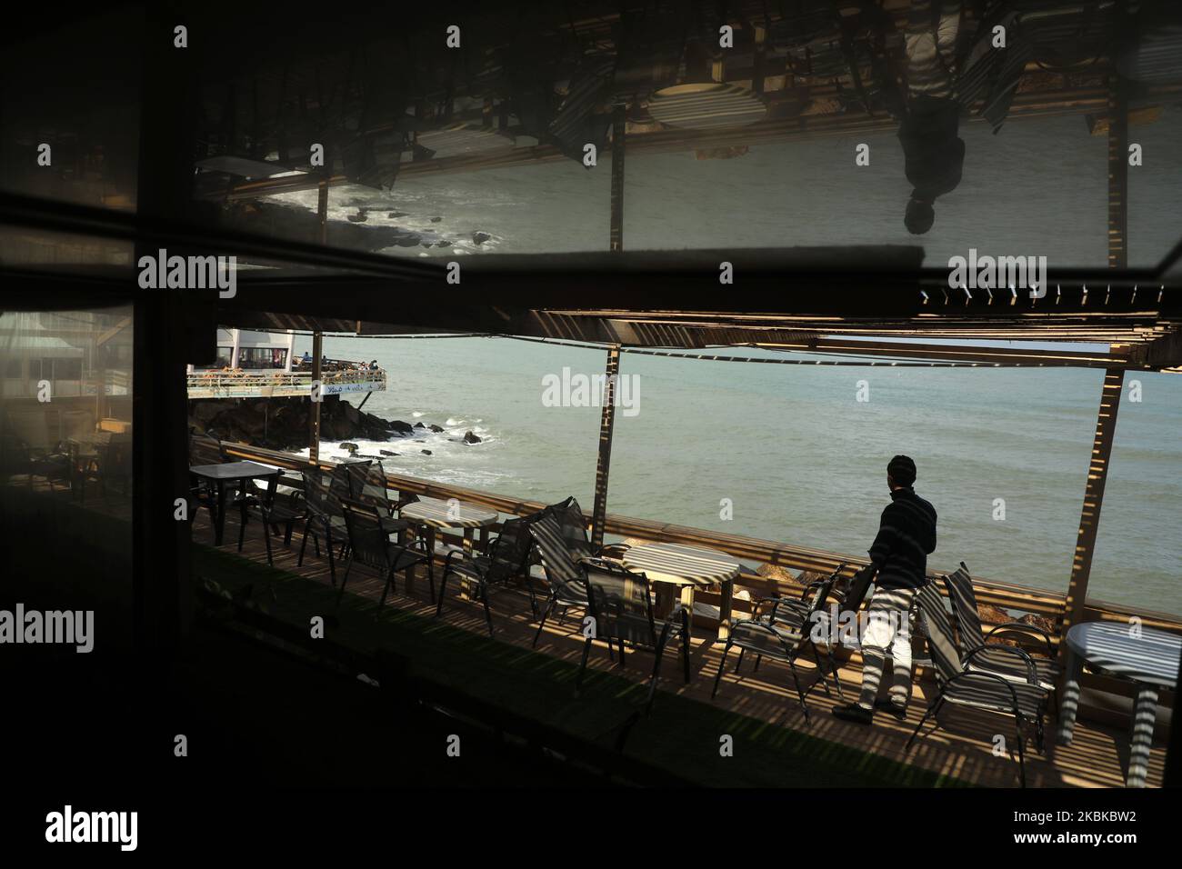 Photo taken on March 22, 2020, A Palestinian stands inside a restaurant ...