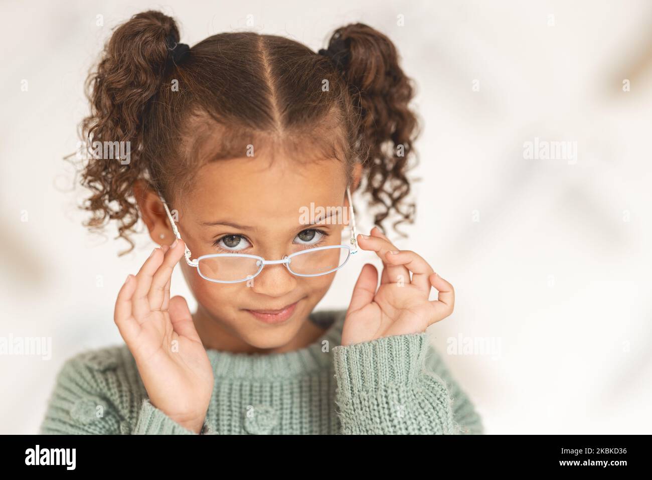 Little girl, glasses and vision portrait with a child wearing ...