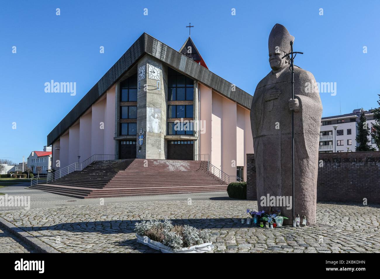 Pope John Paul II monument in front of Catholic Church is seen in ...
