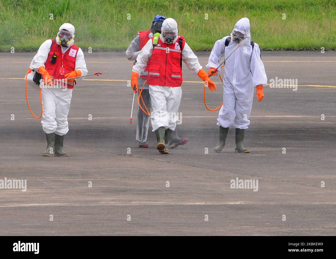 Officers wear hazmat or Corona anti-virus clothes when medical devices ...
