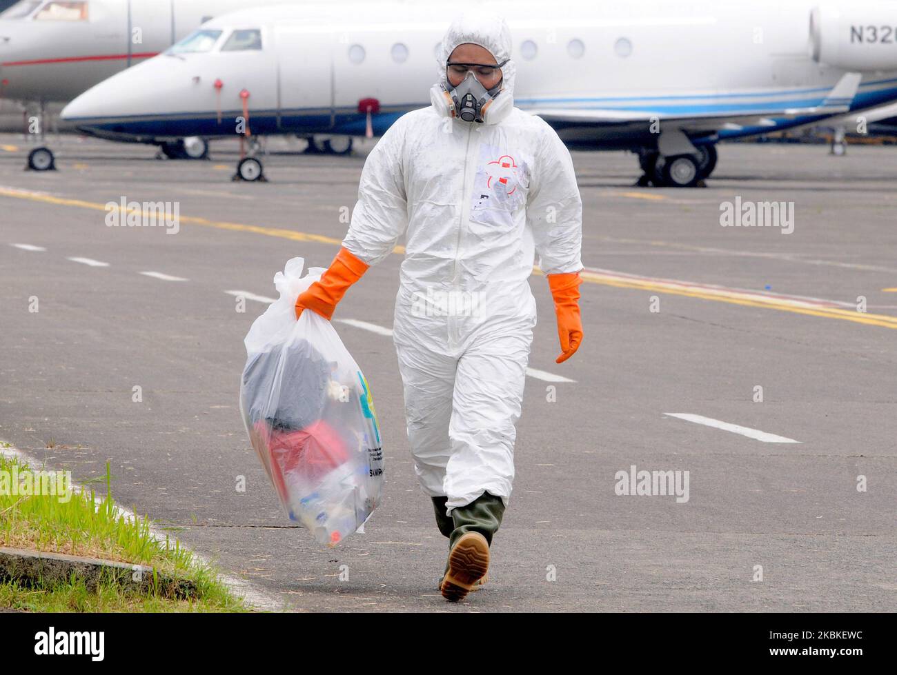 Officers wear hazmat or Corona anti-virus clothes when medical devices ...