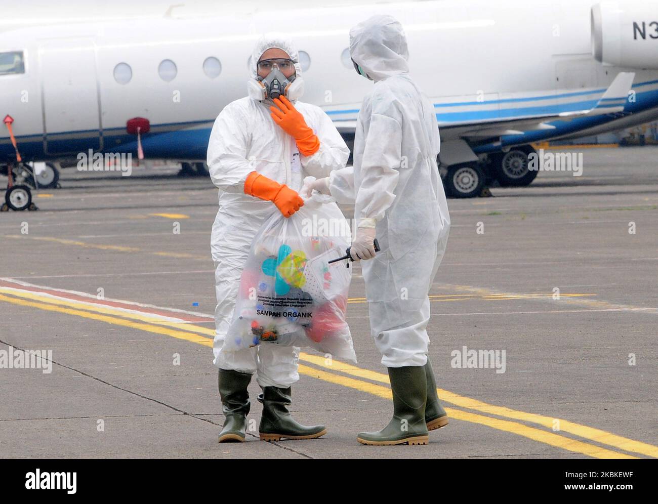 Officers wear hazmat or Corona anti-virus clothes when medical devices ...