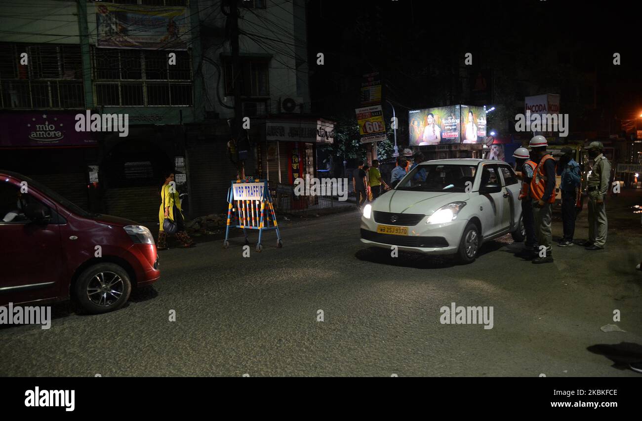Police personnel checks the car after the central governments ...