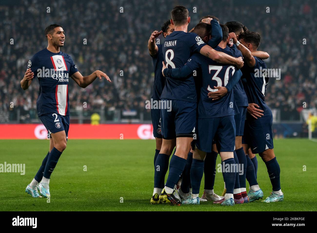 Kylian Mbappe of Paris Saint Germain celebrates with team mates after ...