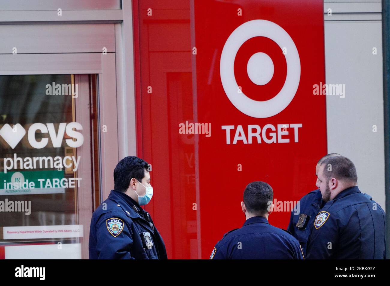 A view of police officers wearing mask in front of Target Department ...