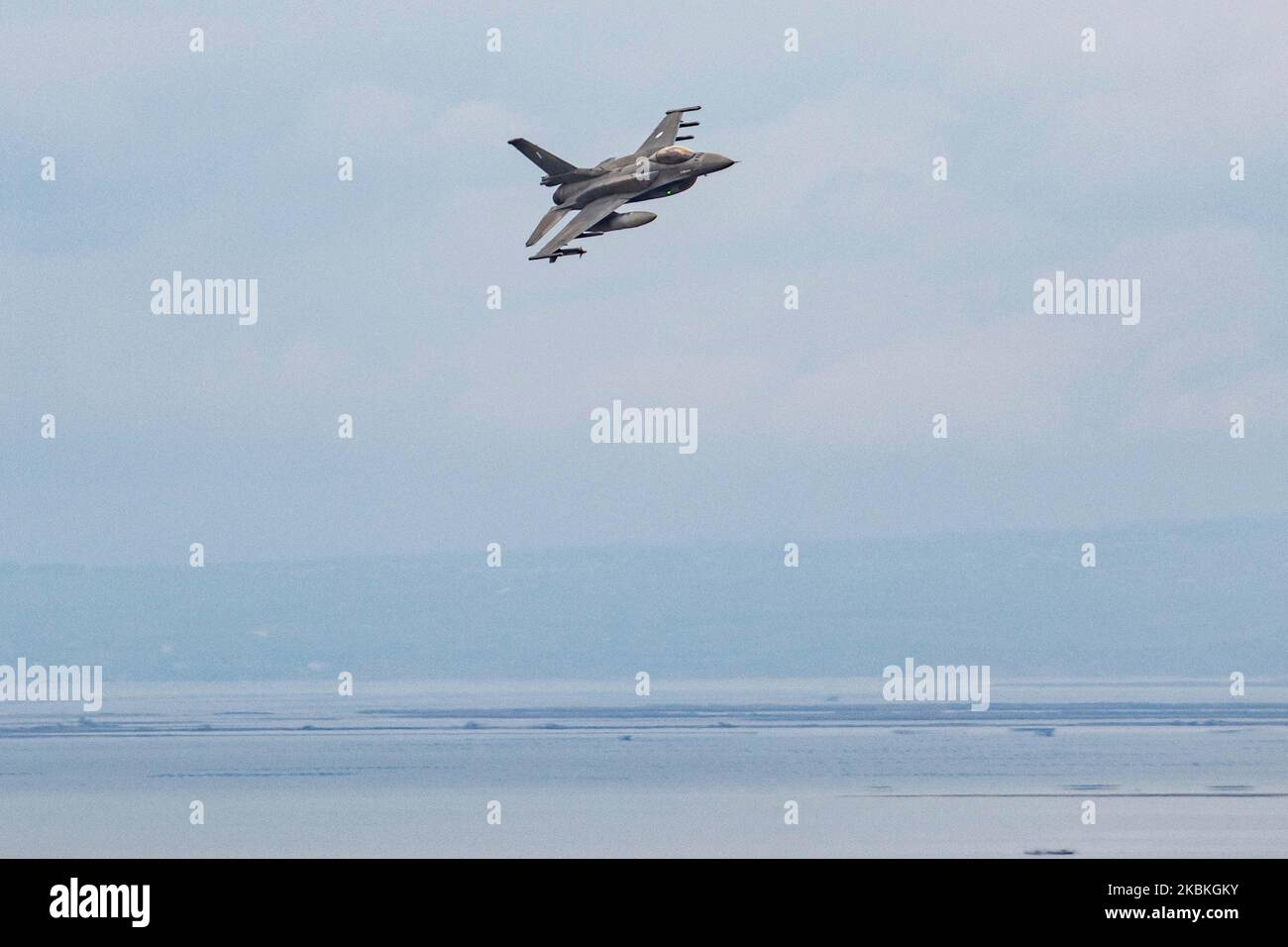 Lockheed Martin F16 fighter jet performing a low pass, fly over ...
