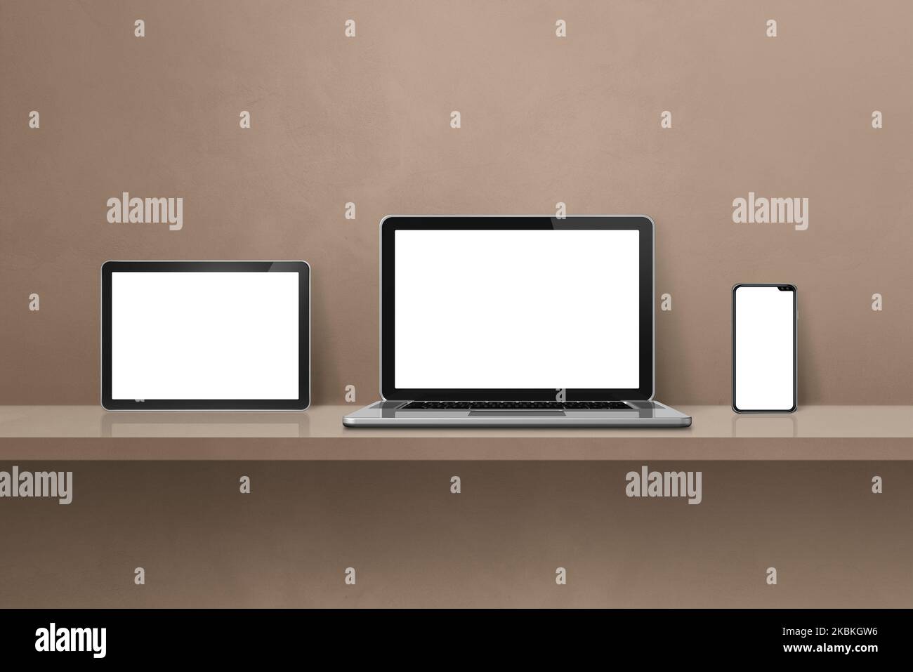 Laptop, mobile phone and digital tablet pc on brown wall shelf ...