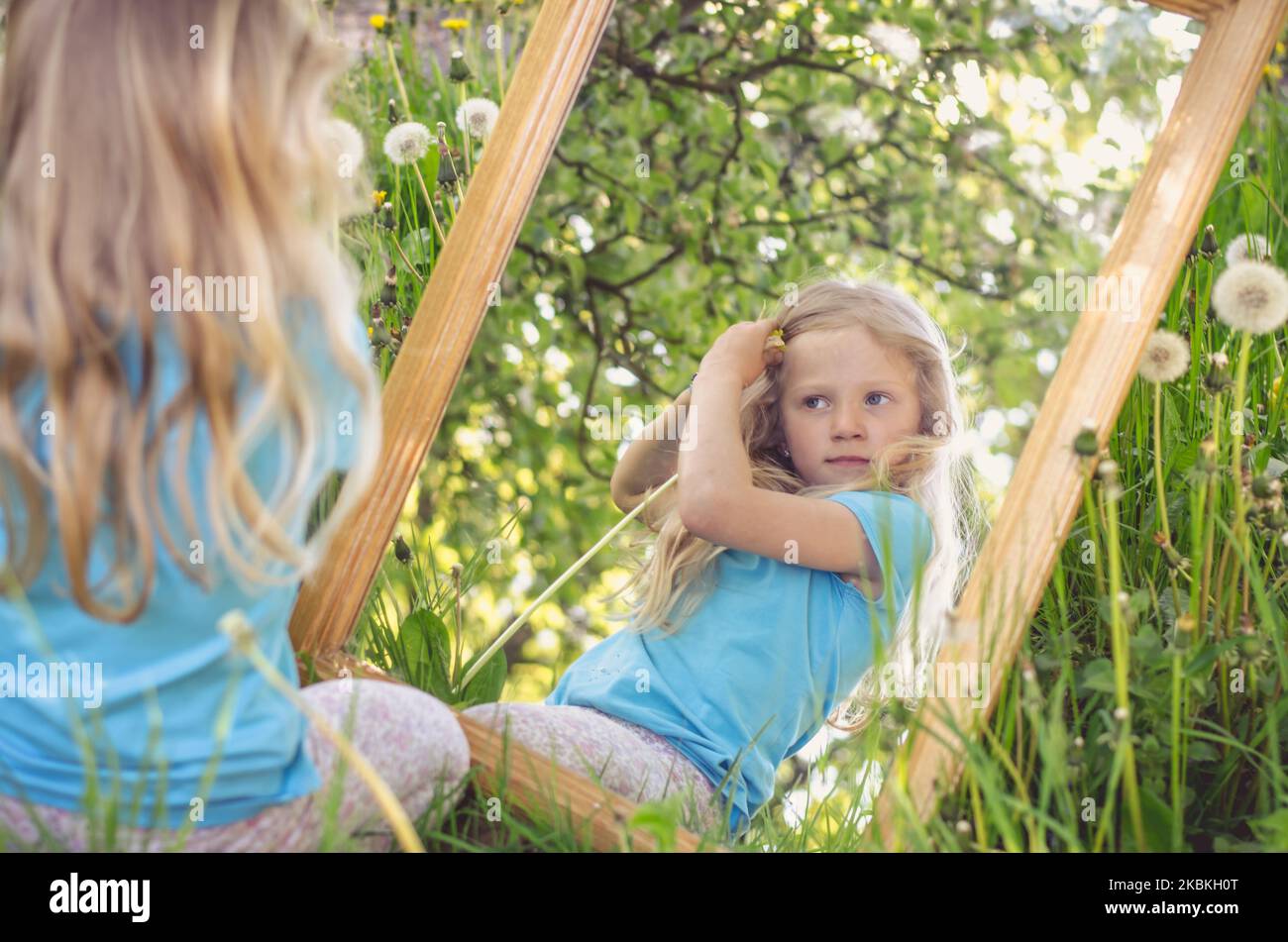 reflection of lovely girl in the mirror Stock Photo - Alamy