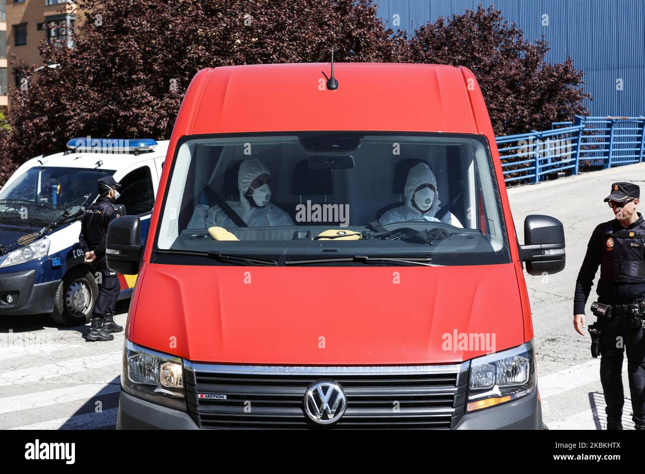 Members of Spanish Emergency Military Unit are seen wearing protective ...