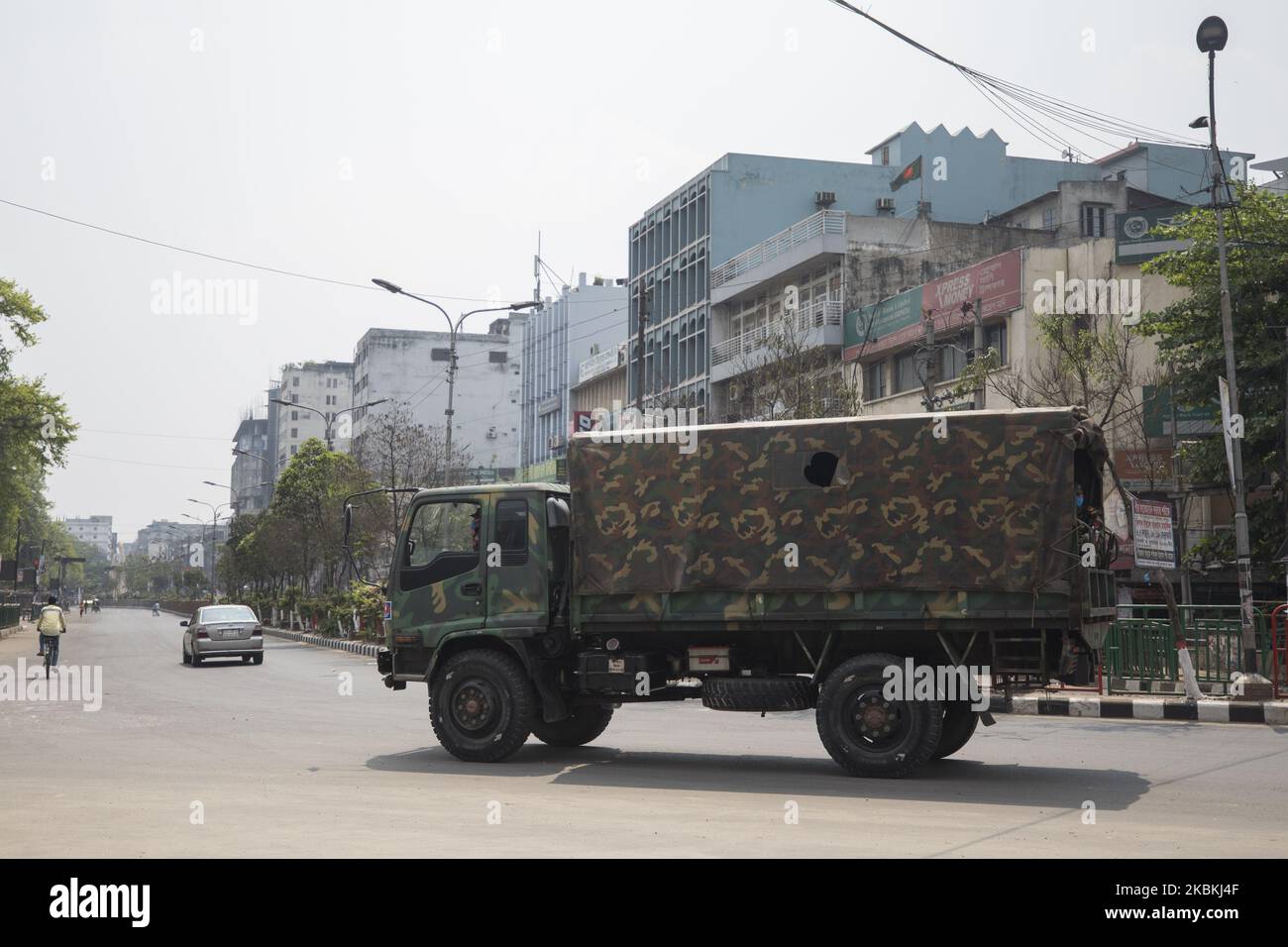 Bangladesh Army personals patrol along in the street in Dhaka amid ...