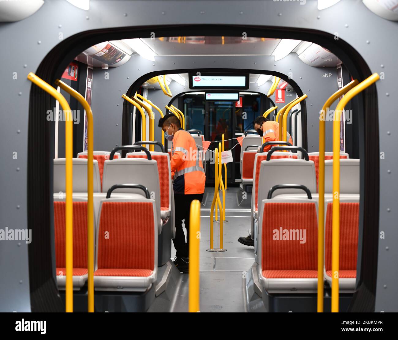 Tram cleaning crew seen sanitising handrails on a Sydney Tram at ...