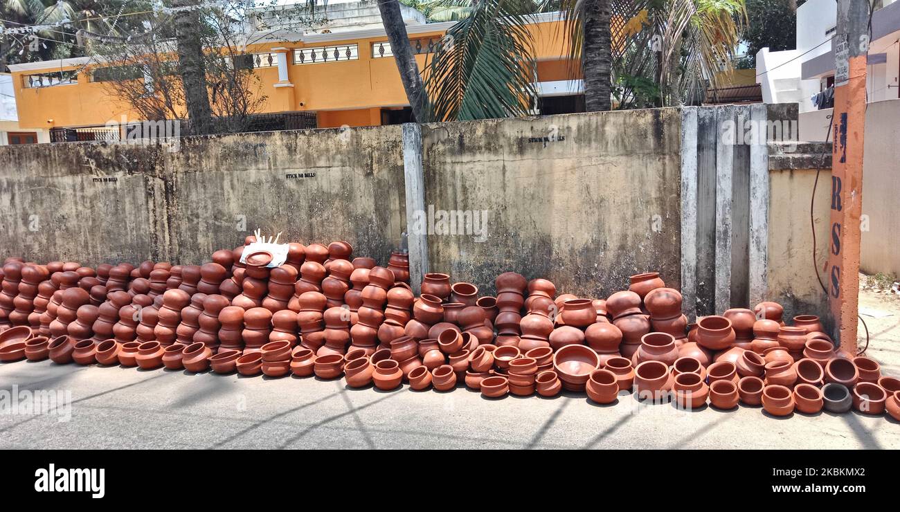 Clay pots for sale along the roadside in preparation for the Attukal ...