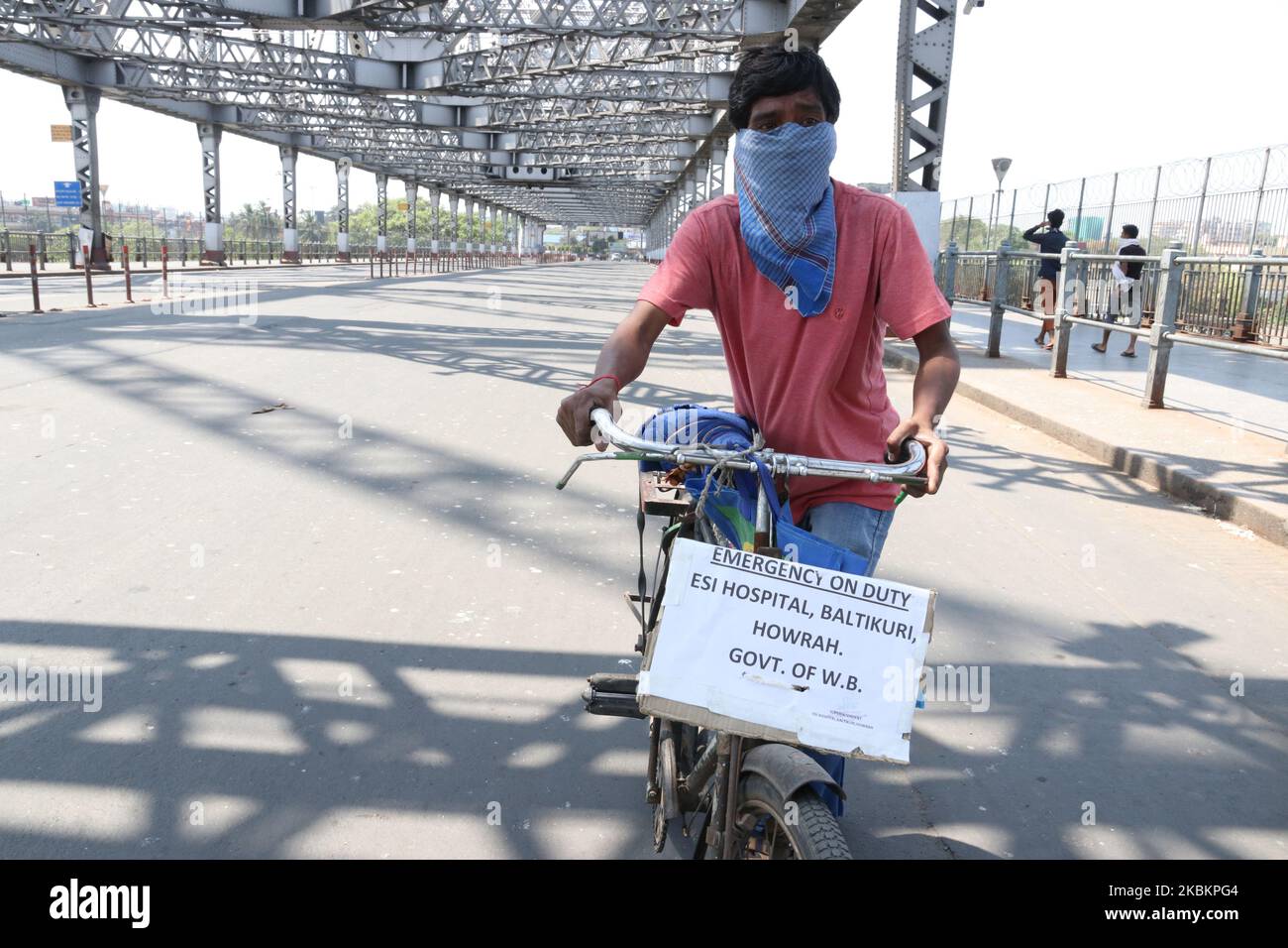 Esi hospital worker cyclist rides hi-res stock photography and images ...
