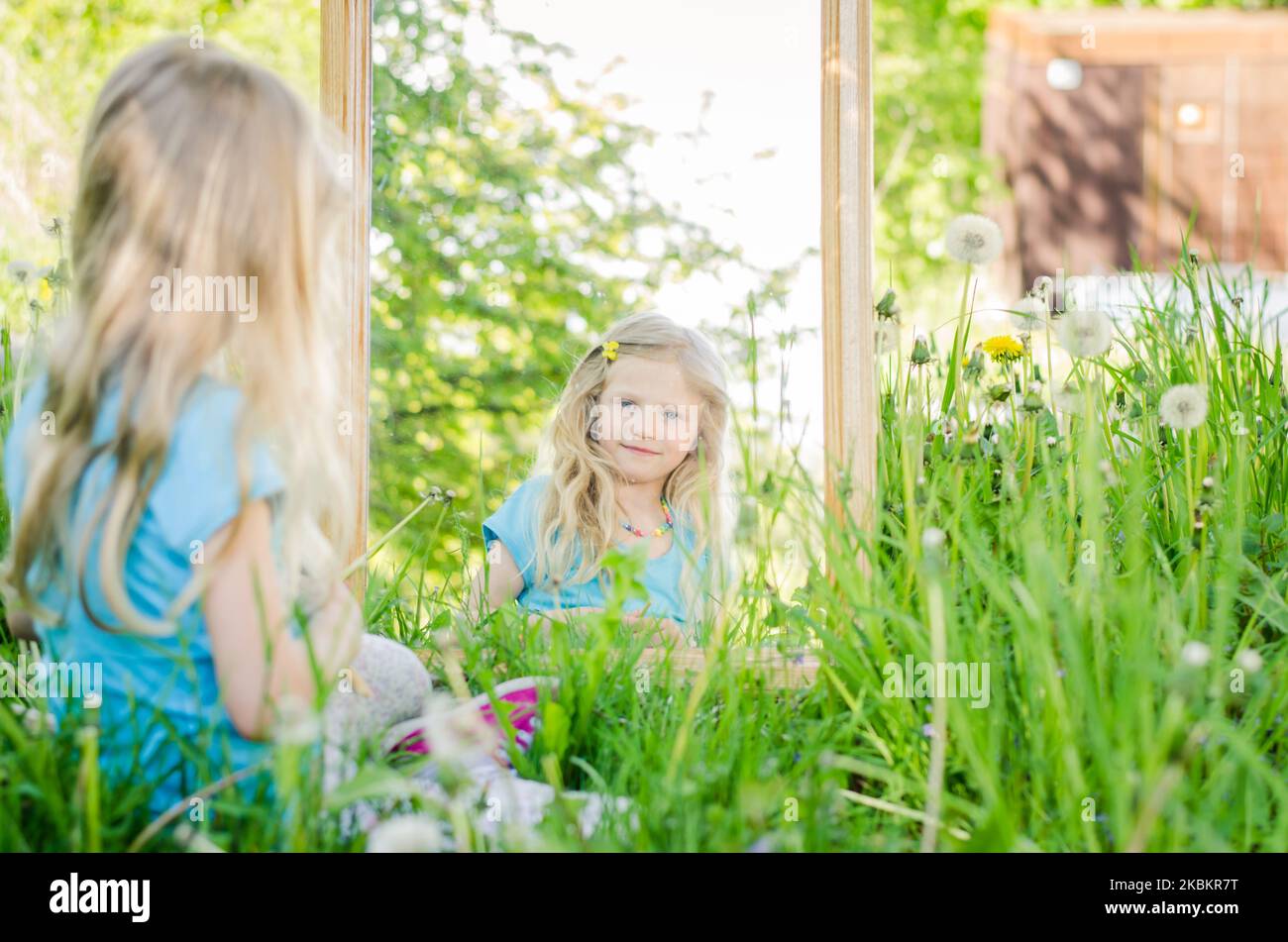 reflection of smiling lovely girl in the mirror Stock Photo - Alamy