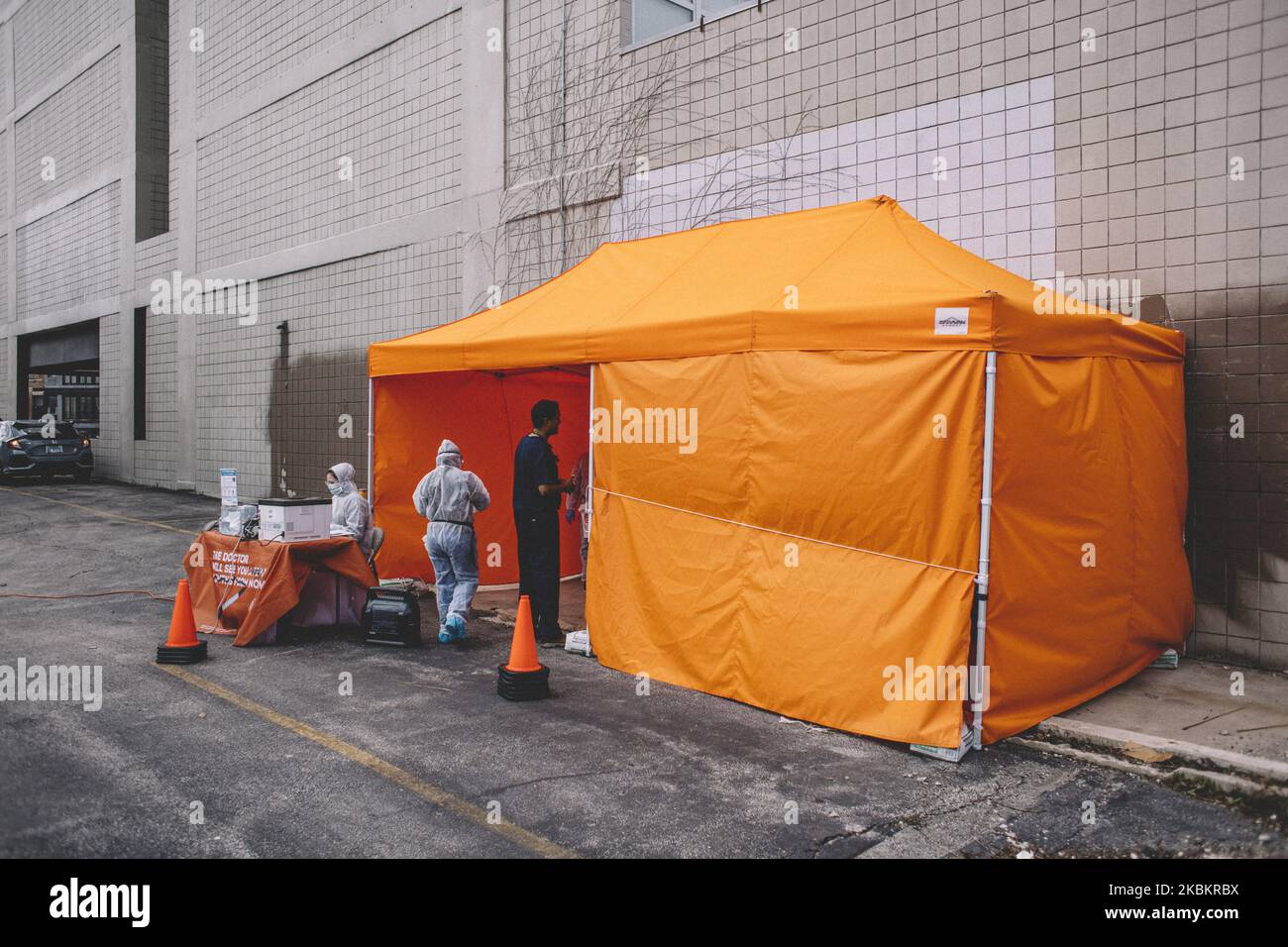 Staff members inside the outdoor facility outside of Innovative Express ...
