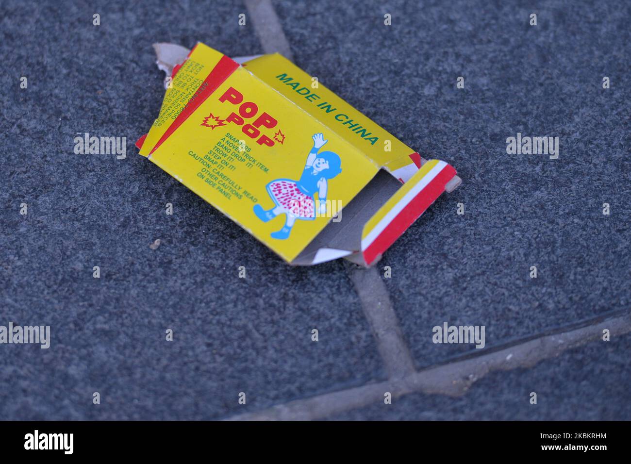 An empty box of snappers, made in China, seen on a street, in Jerusalem ...