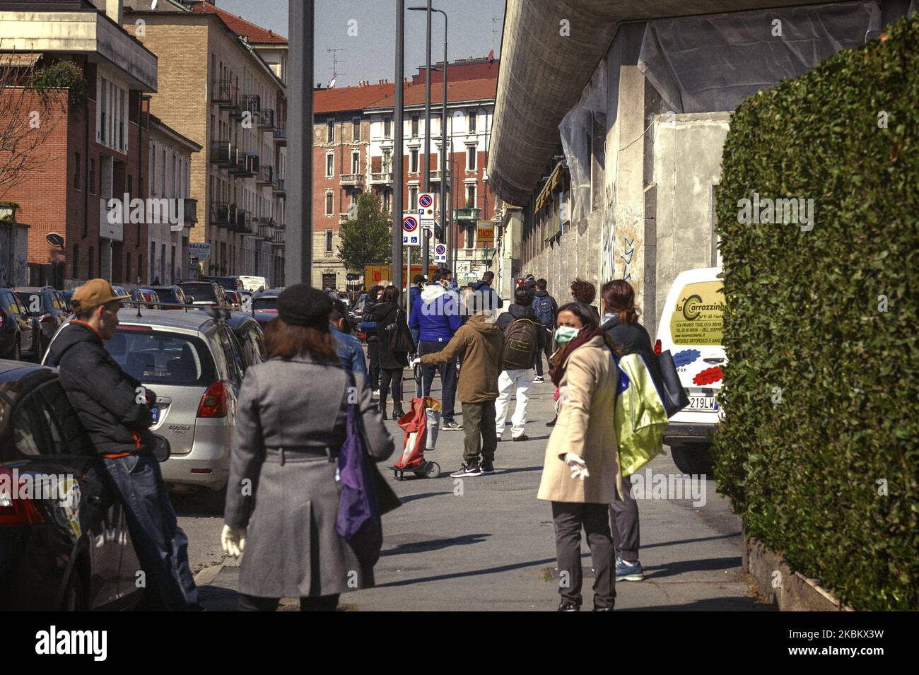 The queue outside the post office to collect the pension. The police ...