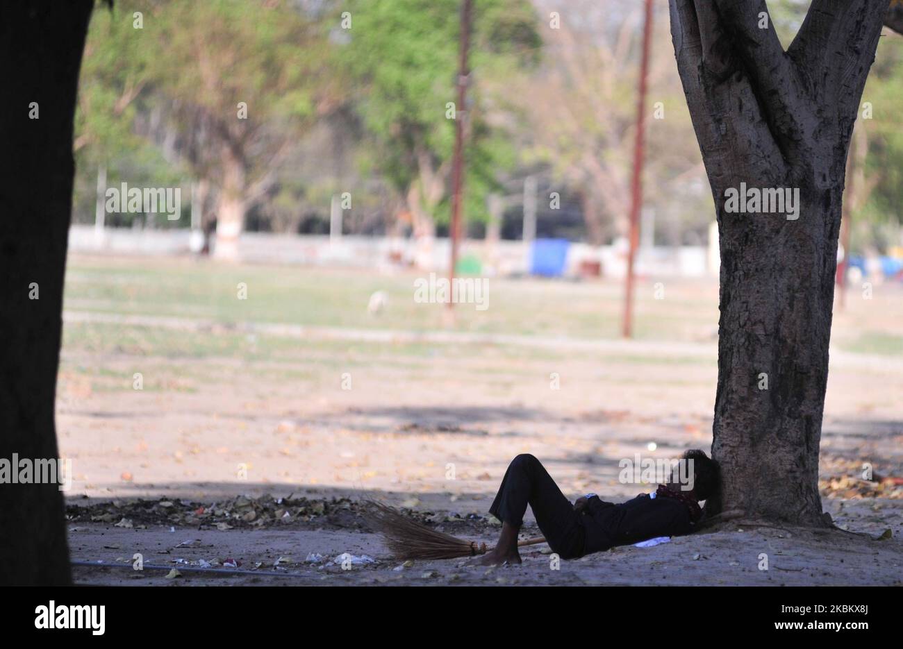 Nap under the tree hi-res stock photography and images - Alamy