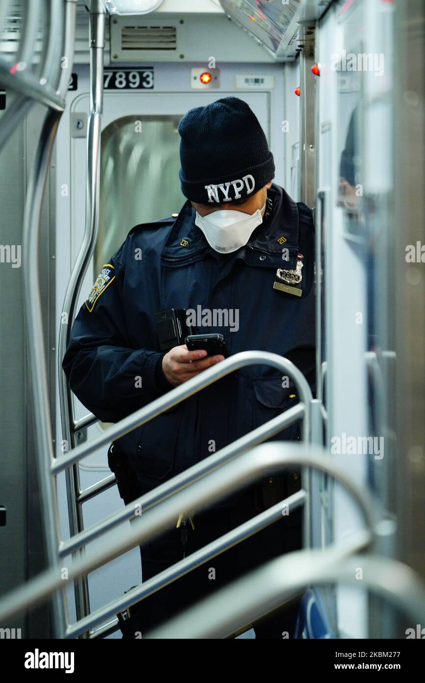 A view of a NYPD police officer wearing mask is seen in Flushing Queens ...