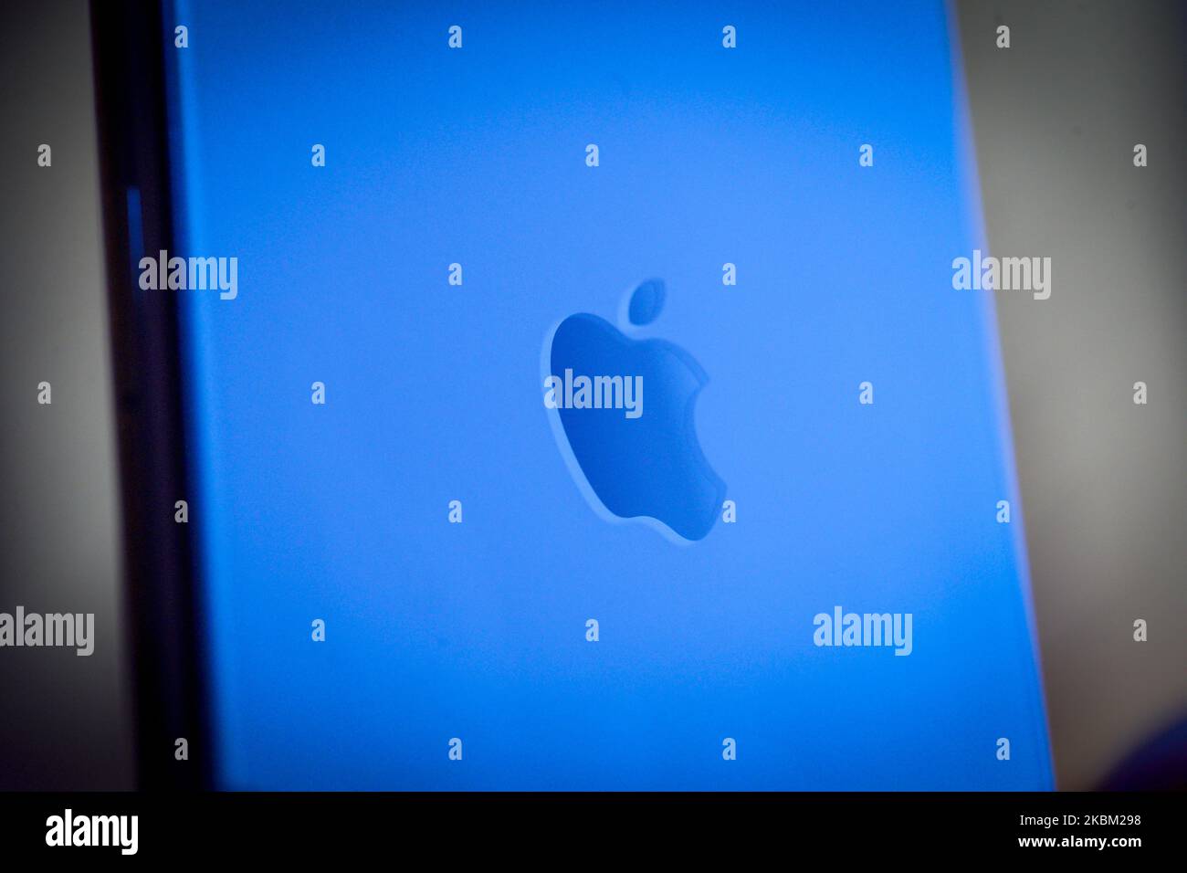 The Apple logo is seen on an iPhone 11 Pro Max in this illustration ...