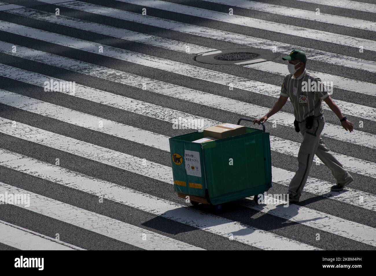Yamato delivery worker hi-res stock photography and images - Alamy