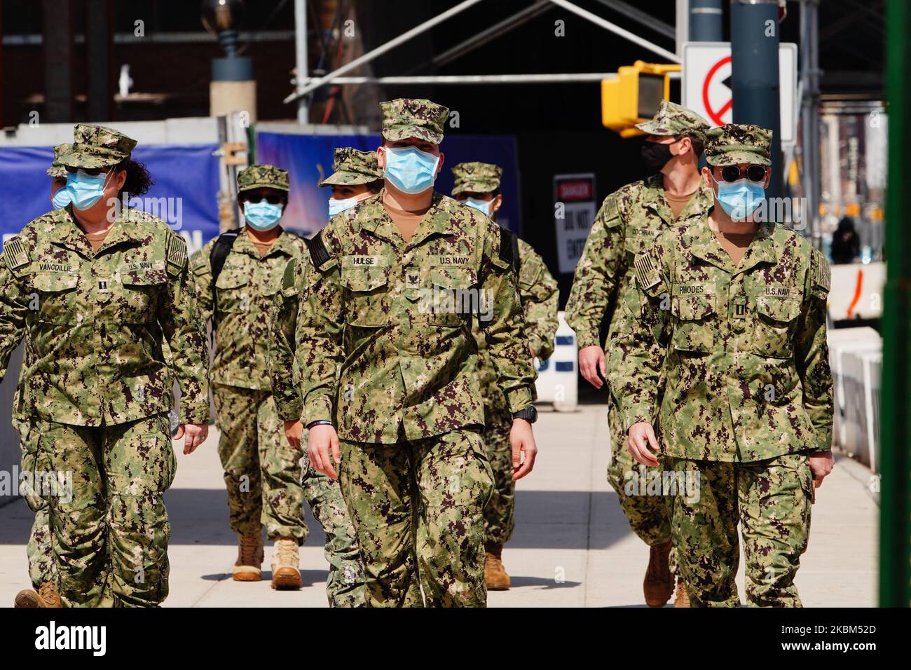 Soldiers are seen during a change of shift at the Javits Center a ...