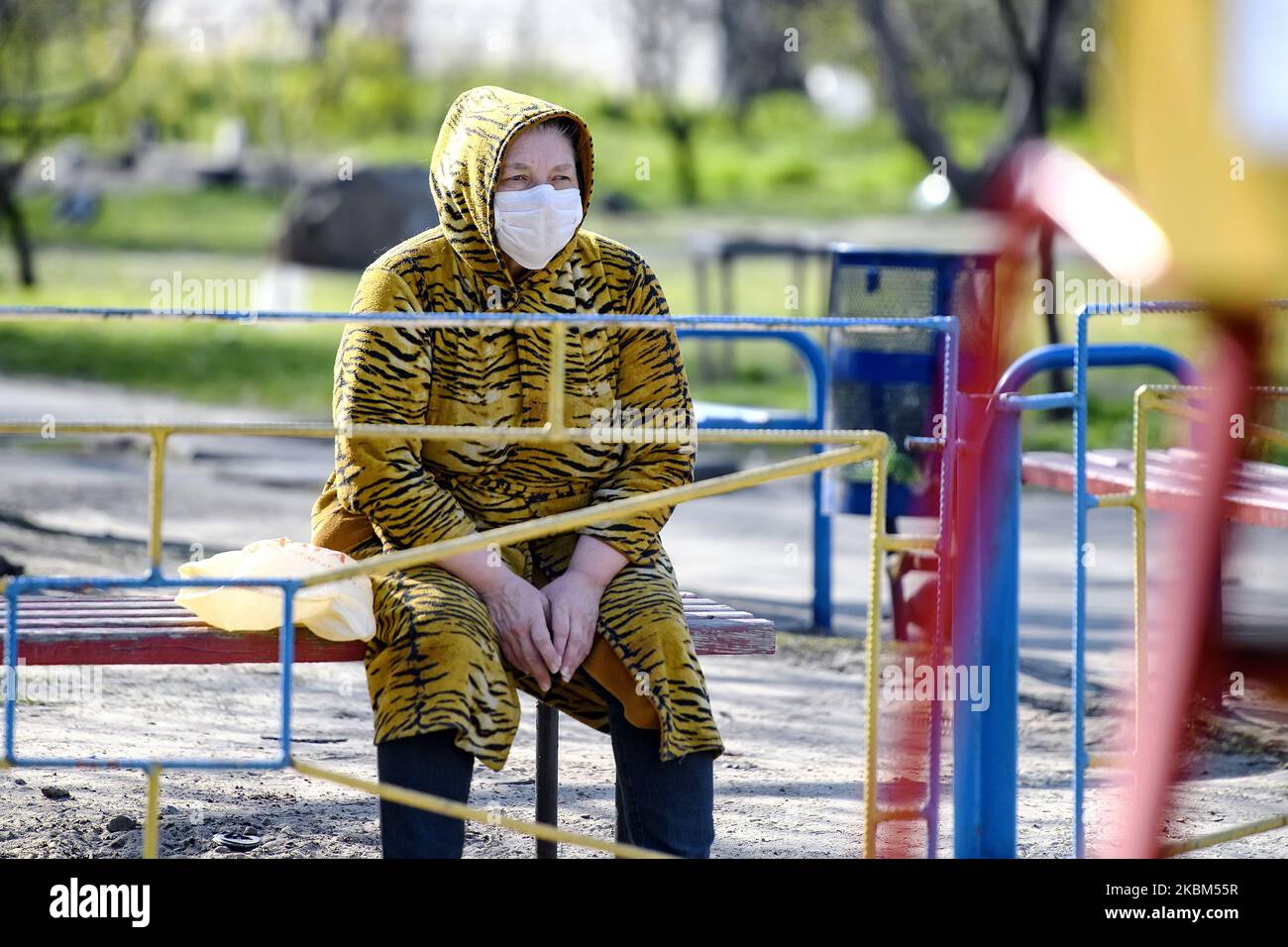 Elderly woman in protective mask as a preventive measure against the ...
