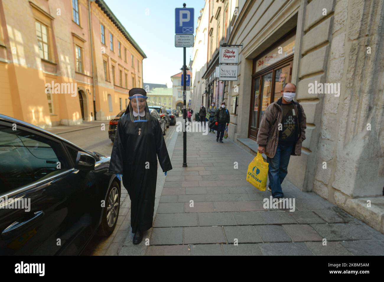A nun from the religious order of the Sisters of the Canon of the Holy ...