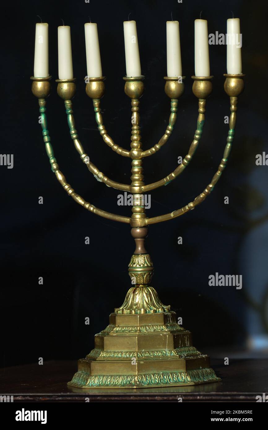 The menorah lamp seen in a closed Ester restaurant's window in ...