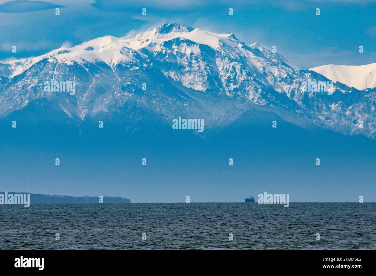 Snow-covered Mount Olympus as seen from Thessaloniki city in Greece ...