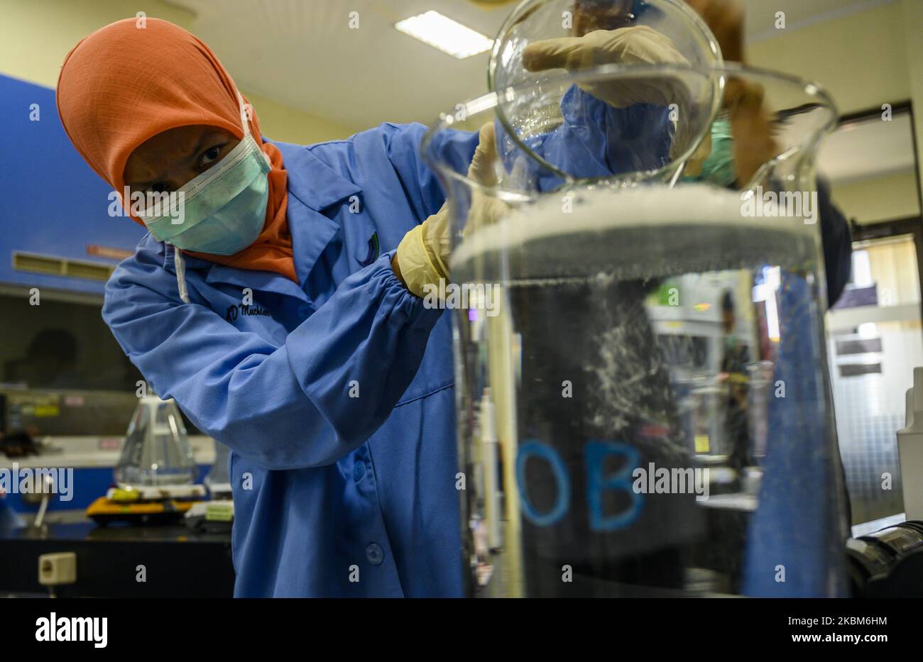 An employee of the Palu Center for Drug and Food Control (BPOM ...
