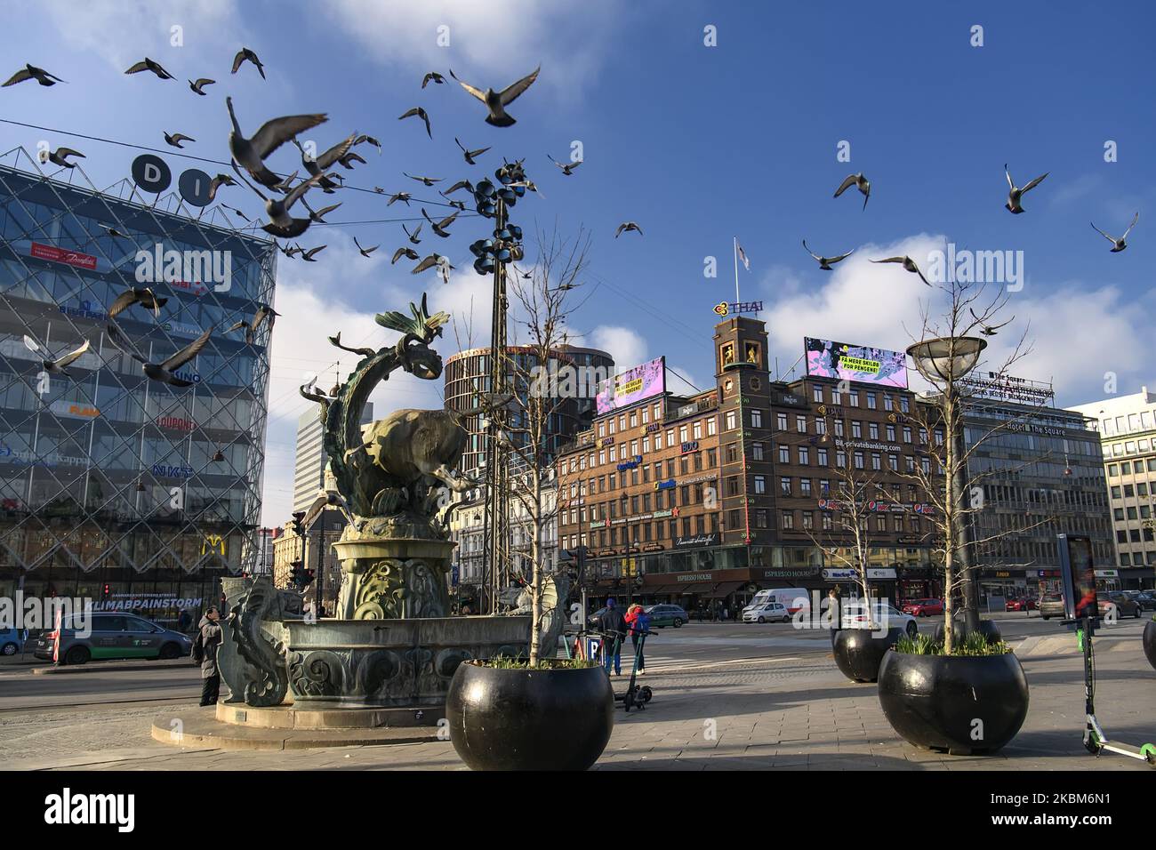 Fountain with bronze sculpture of bull and dragon on City Hall Square in Copenhagen, Denmark on ...