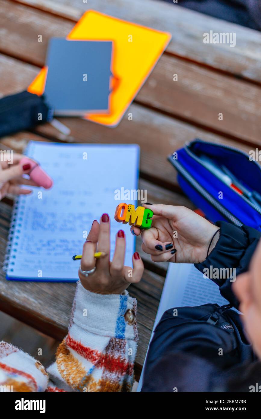 A high school girl made a mistake in her homework. She is taking the ...