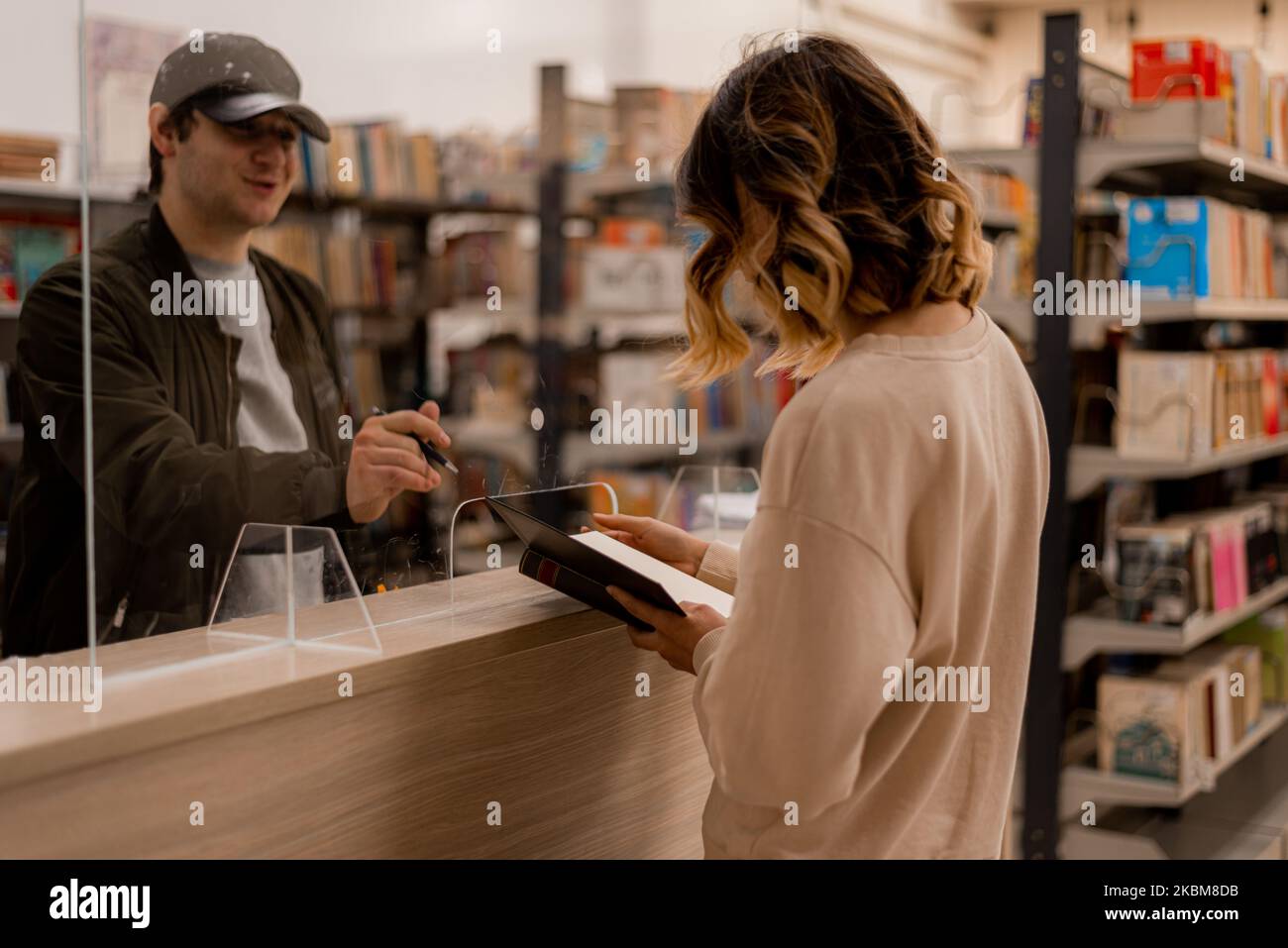 Student librarian talking hi-res stock photography and images - Alamy