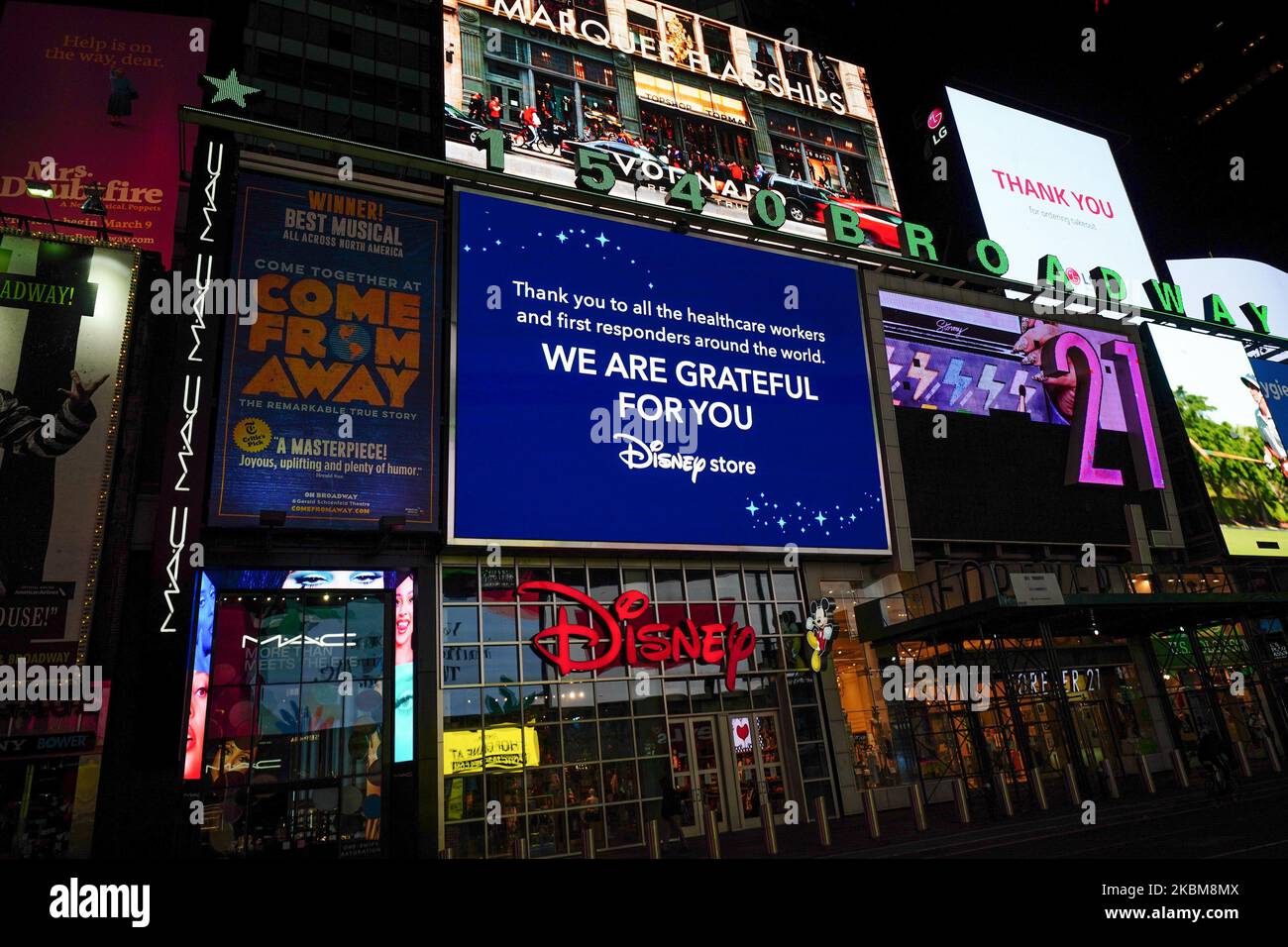 Digital billboard flashes signs of support for medical workers in Time ...