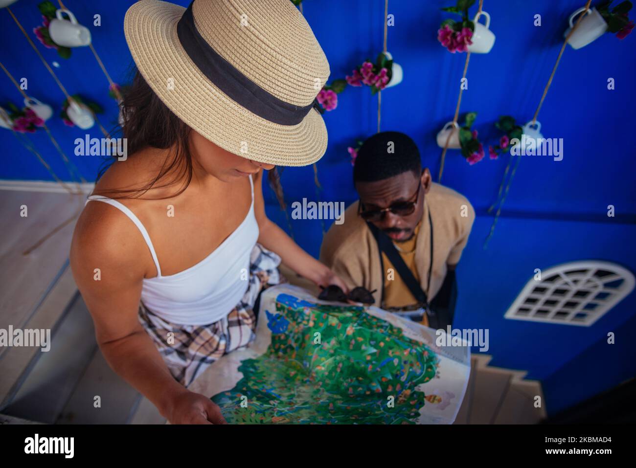 A male and female tourists still cannot find their next destination on ...