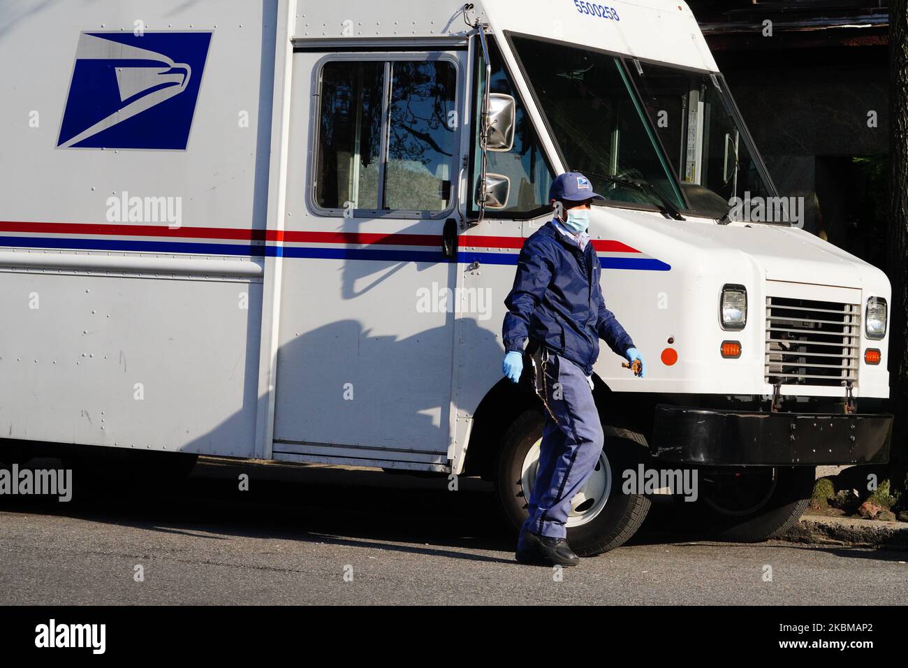 A view of a USPS mailman in Flushing, New York, USA during coronavirus ...